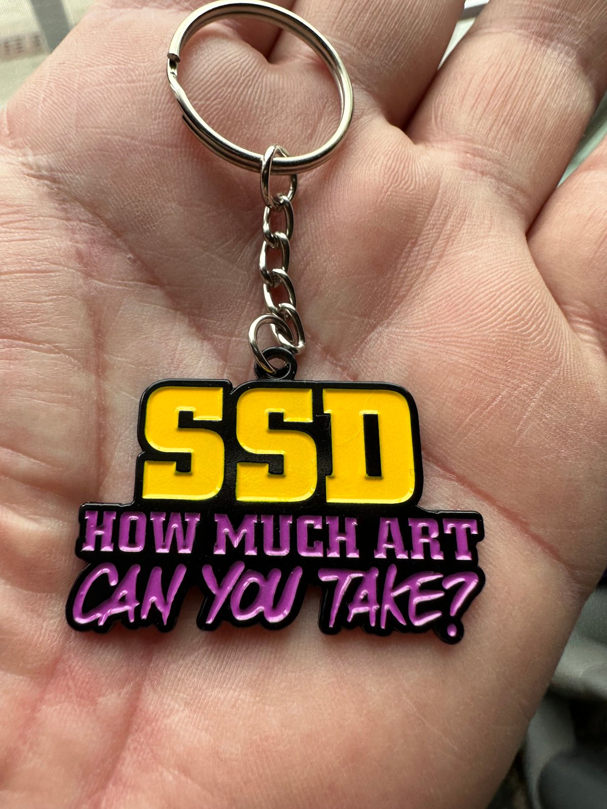 SSD “How Much Art” metal keychain | XCLAIM - Al Barile’s Original ...
