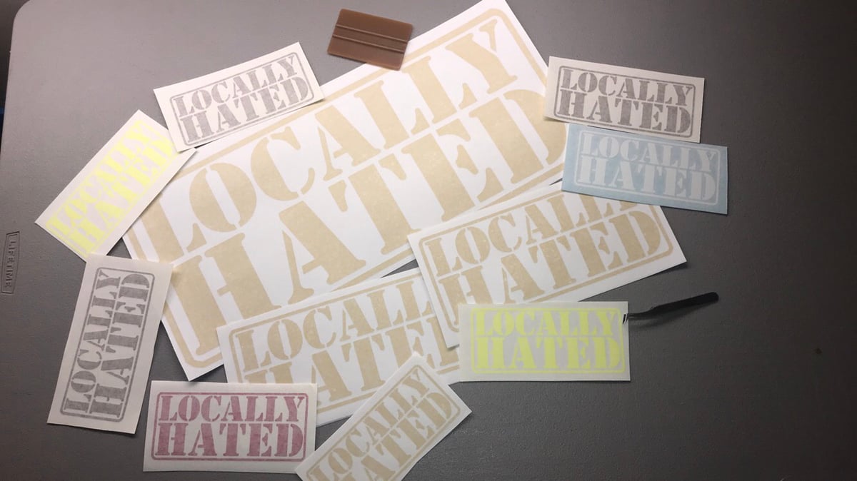 Locally hated — 12x5 badge decal