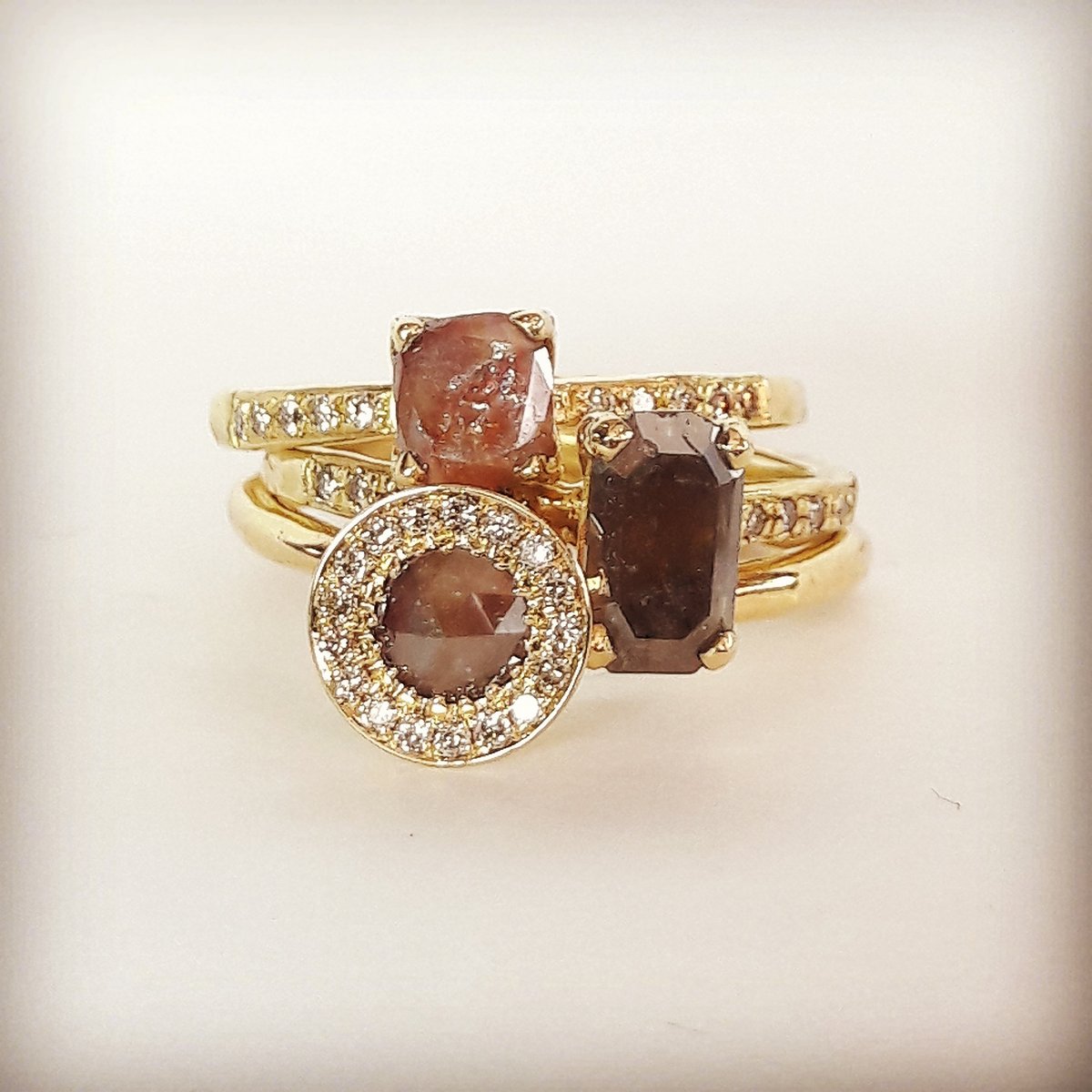 Rare diamond cut stacking rings / emenel goudsmeden