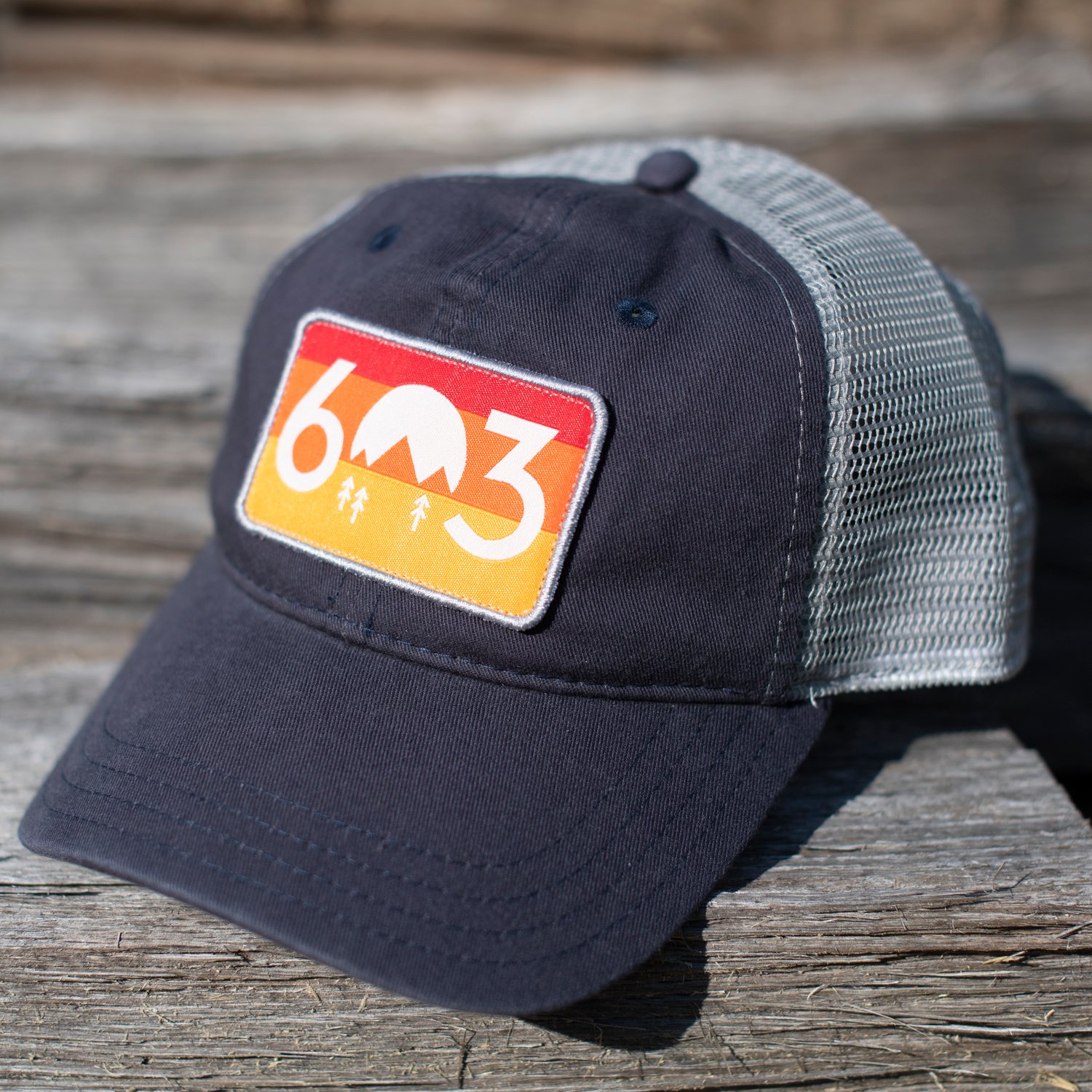 603 sunset trucker hat - navy/grey | New Hampshire Apparel