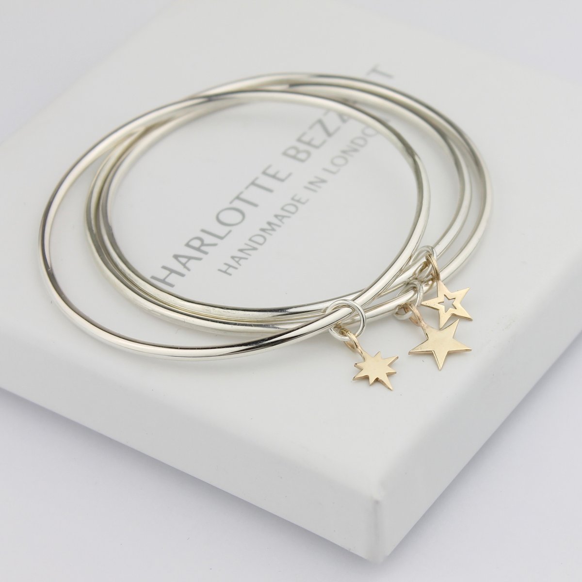 Set of three star bangles in silver and 9ct gold | Charlotte Bezzant ...
