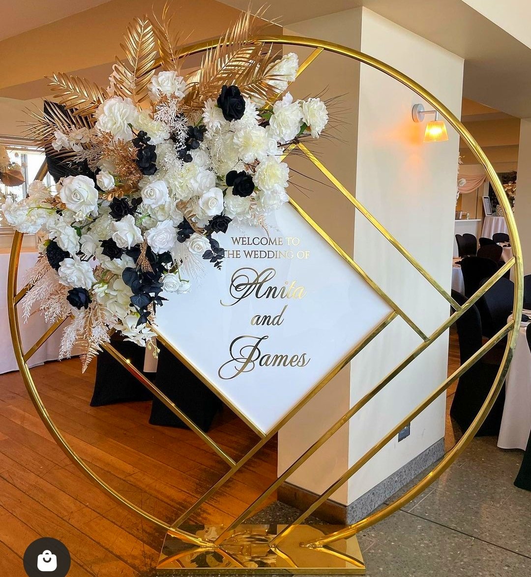 Shinny gold round metal backdrop | PKLux Party Rentals