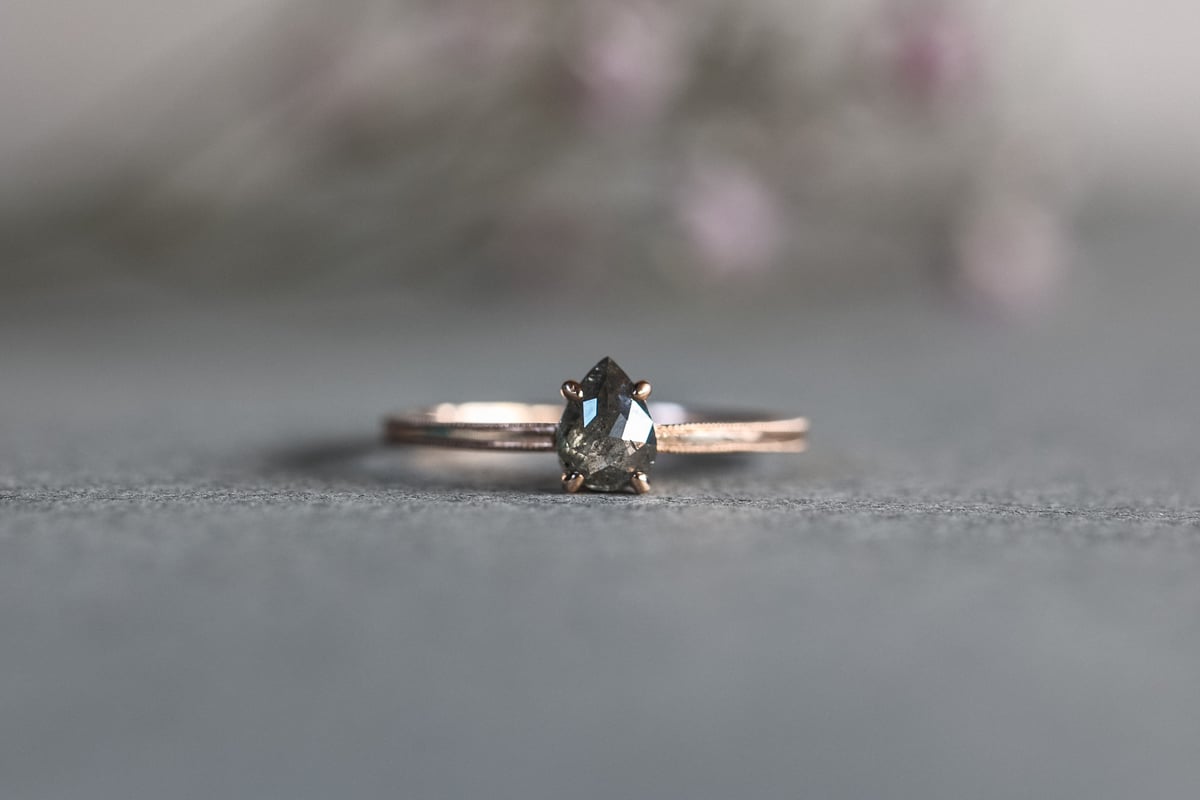 18ct Rose Gold, Pear shaped Dark Grey Diamond ring with mill grain edge ...