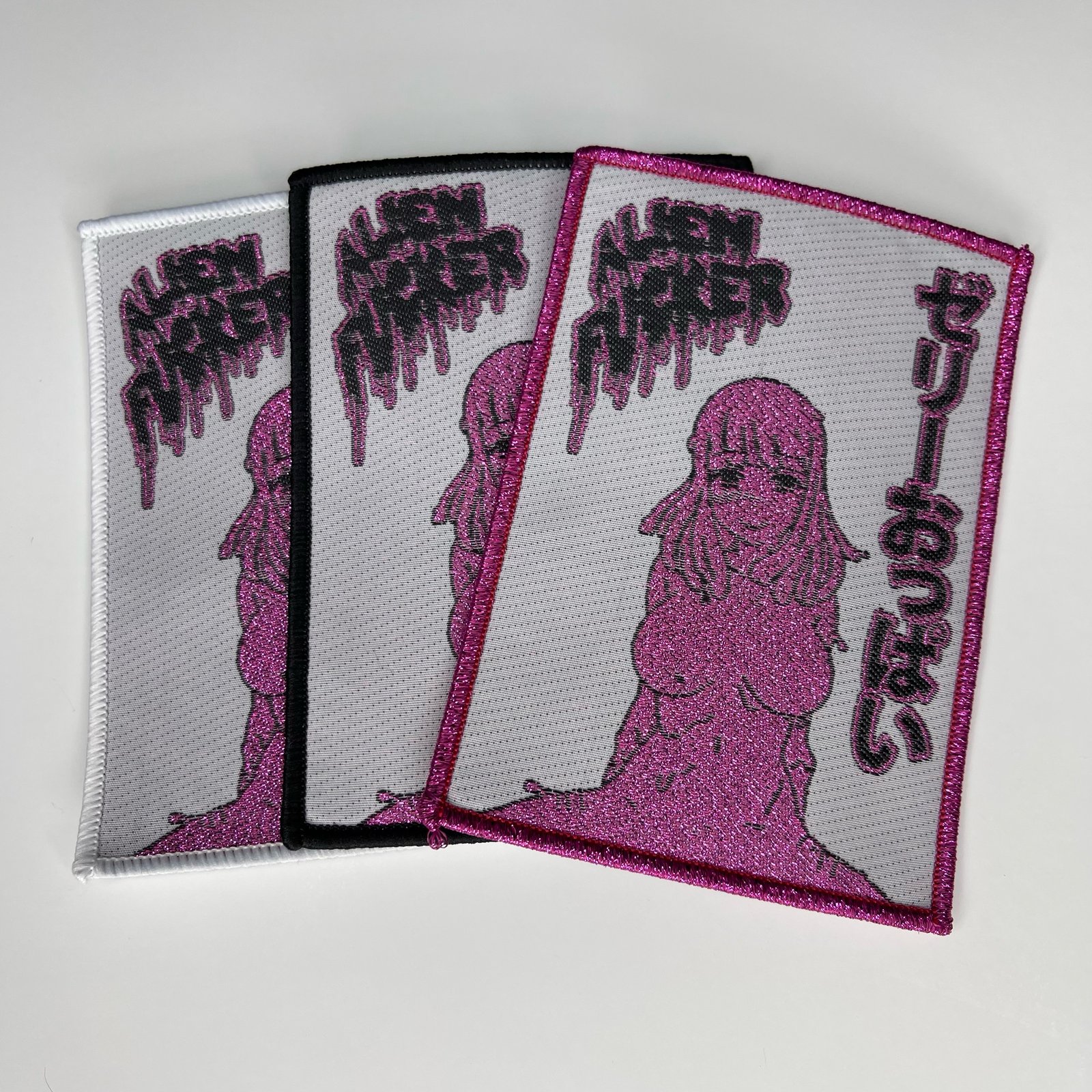 Alien Fucker - Glitter Waifu Woven Patch | Armed With Hammers Productions Alien Fucker - Glitter Waifu Woven Patch | Armed With Hammers Productions