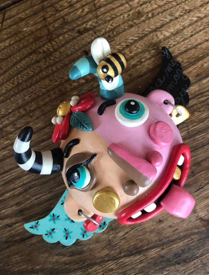 MAGICAL series - Winged Devil with Tongue Sticking Out Clay Sculpture ...