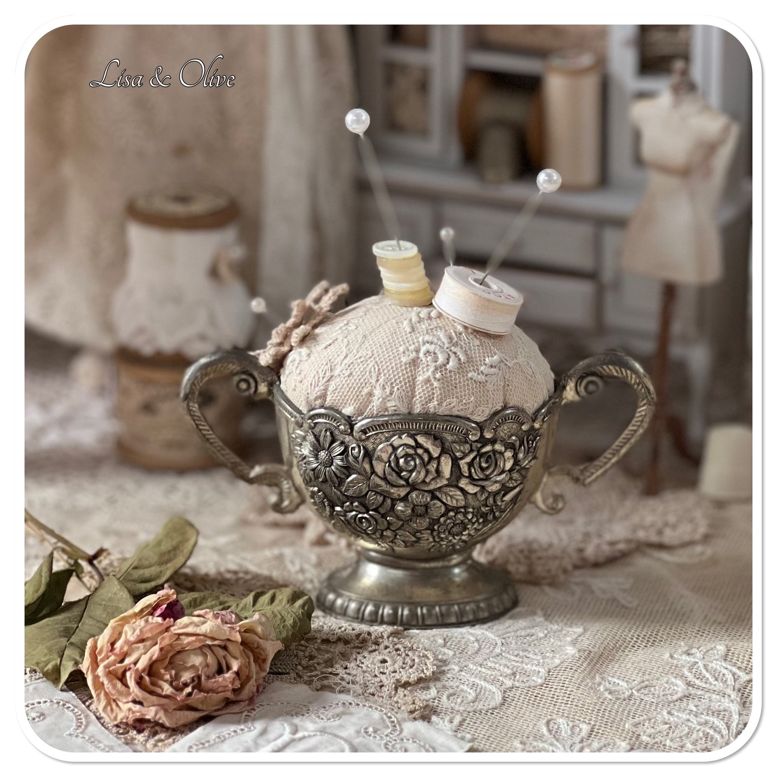 Handmade pin cushion in a silver style cup with two handles | Lisaandolive