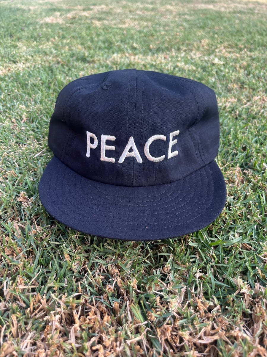 Peace Word Hat Black | Ramos Center