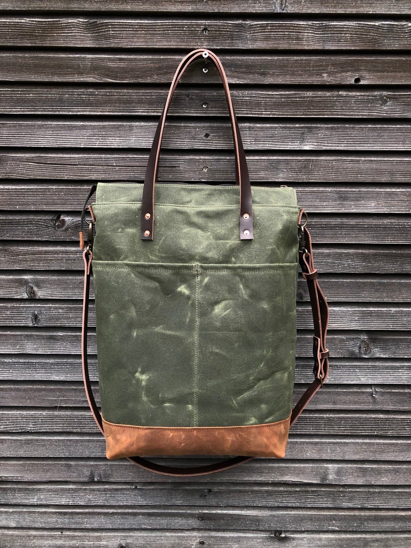 Vertical tote bag made in waxed canvas with leather straps and cross ...