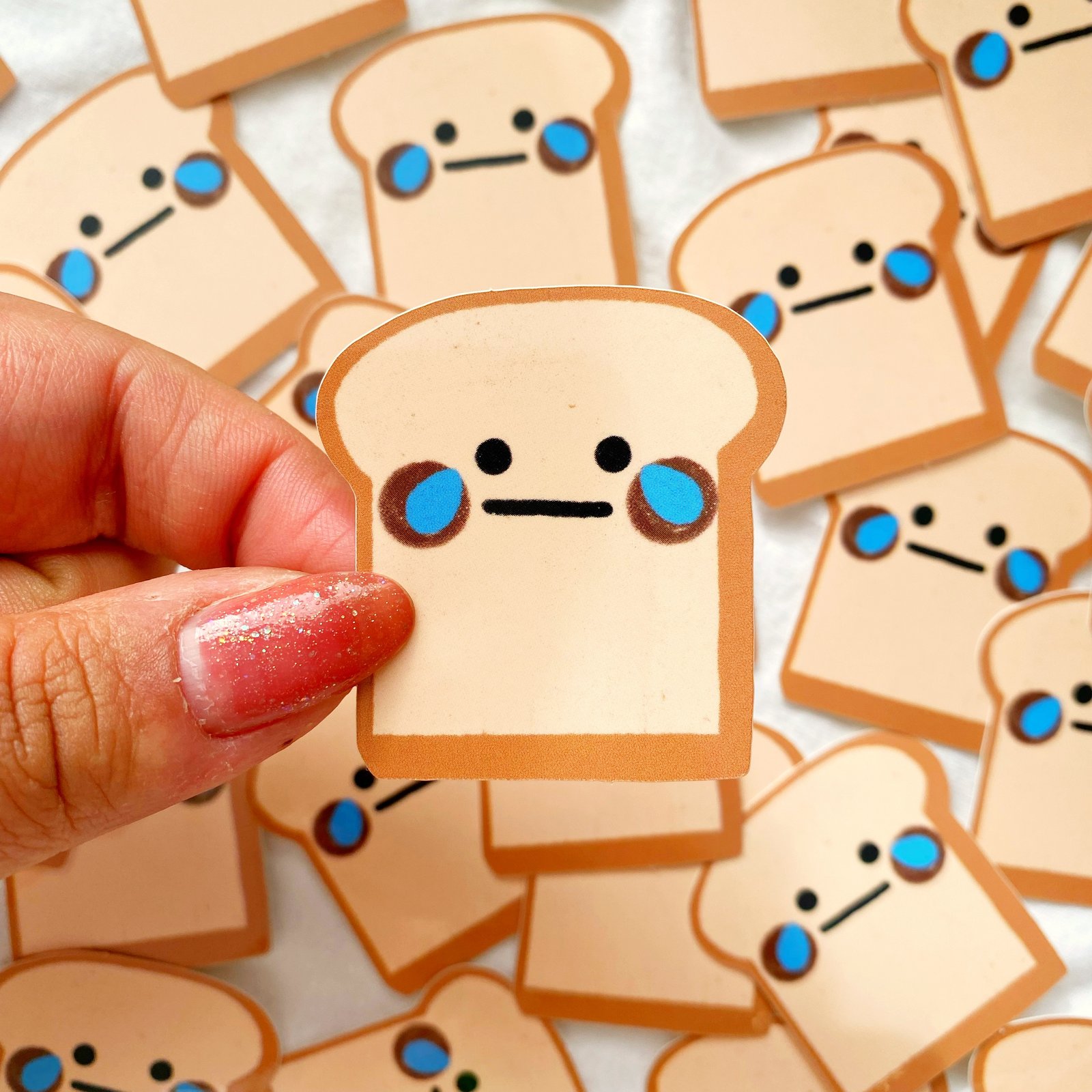 “In pain” glossy vinyl sticker flake | Ashionery