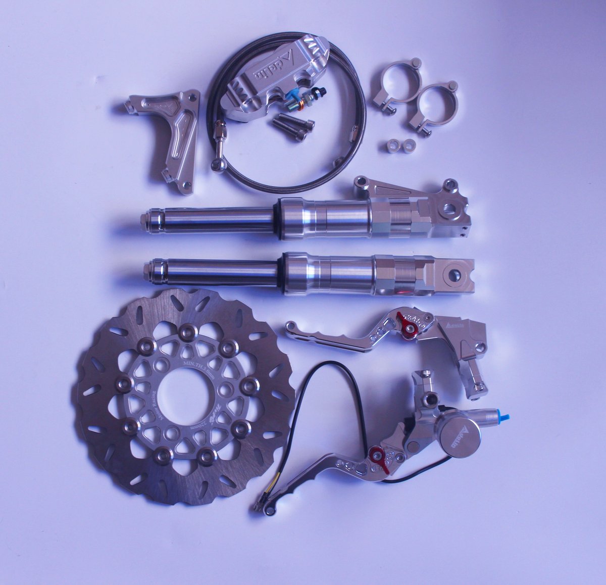 HONDA RUCKUS FRONT DISC BRAKE SET UP WITH LOWDOWN FORKS | Reckless Customs